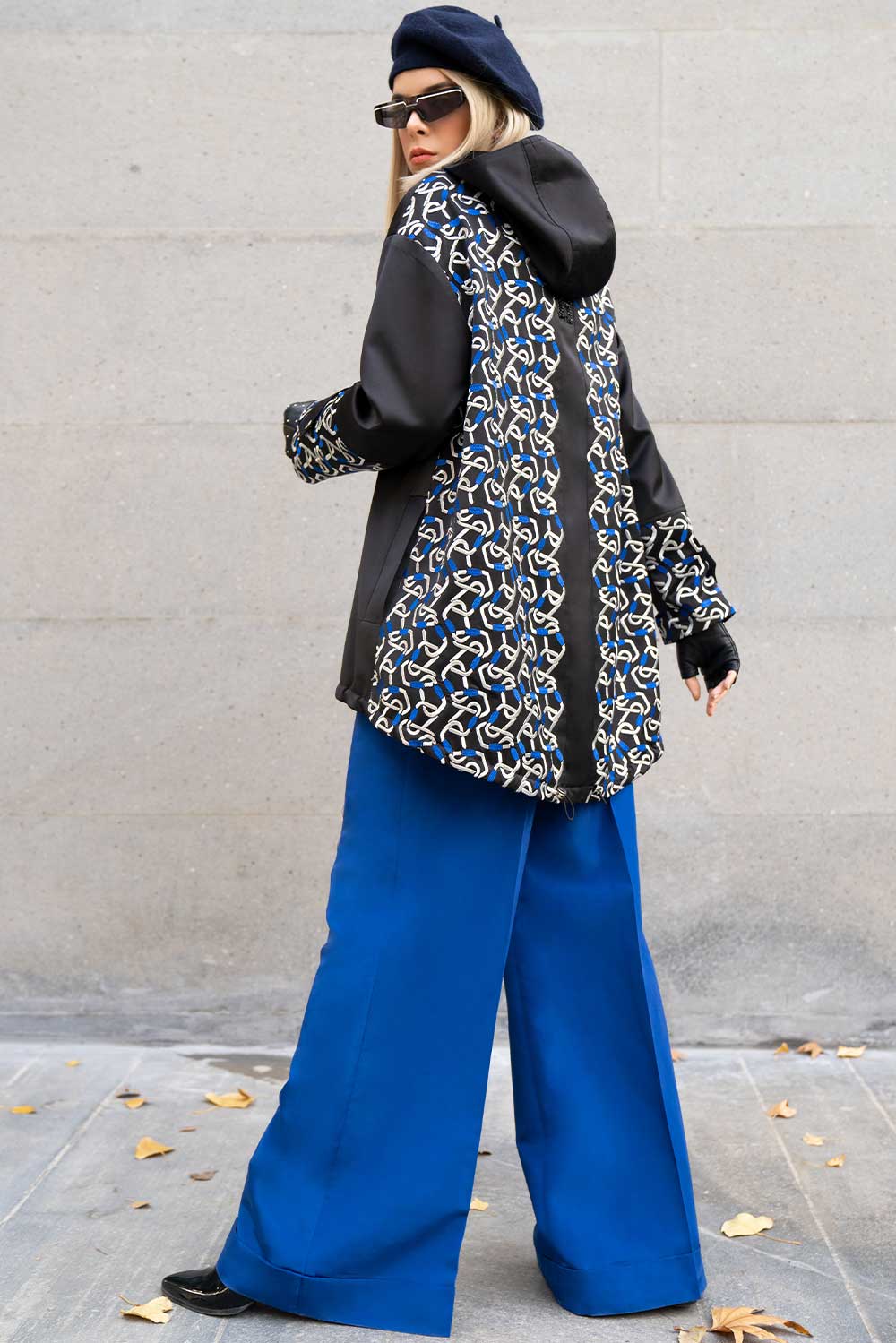 Black swing rain coat with hood – embroidered chain pattern on cuffs ...